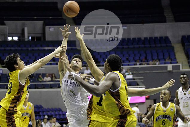 NU Bulldogs down UST Tigers to grab share of third spot and boost bid ...
