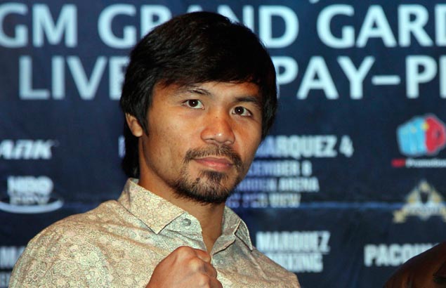 Pacquiao leaves for US as hard grind begins for fight with Marquez