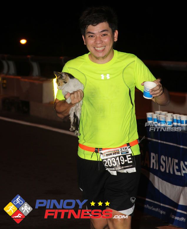 Marathoner Magnaye recounts why he finished race with stray cat in his arms